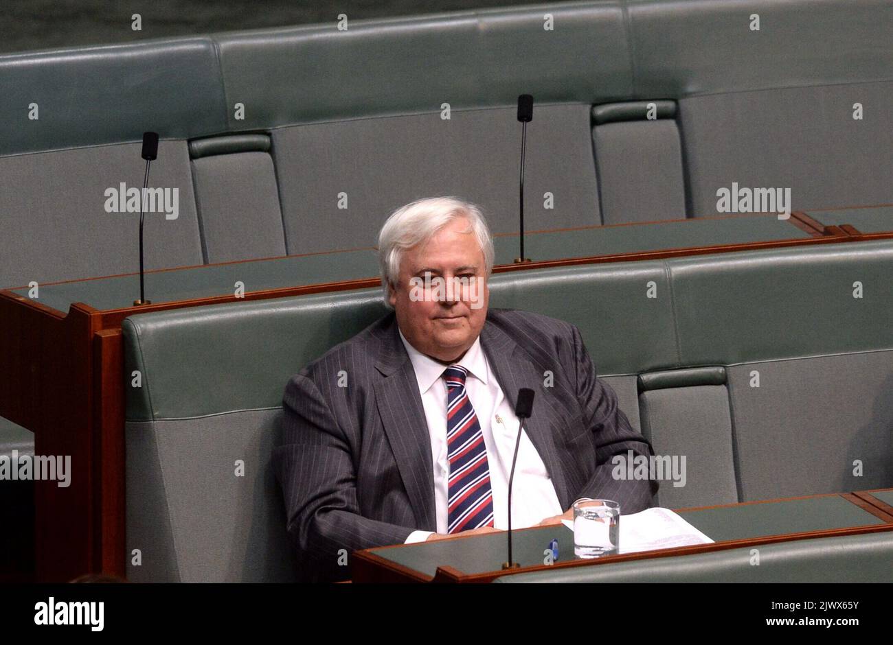 Palmer United Party leader Clive Palmer listens during House of ...