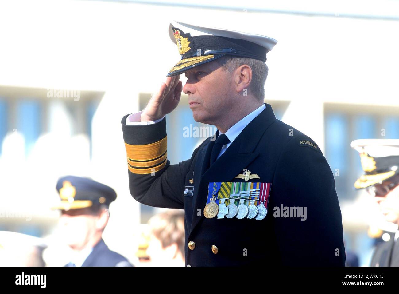 The new Chief of Navy Vice Admiral Tim Barrett salutes during the ...
