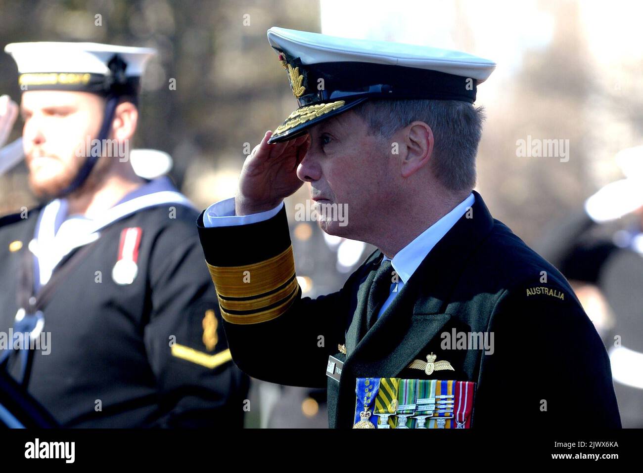 Chief of Navy Vice Admiral Tim Barrett salutes during the handover of ...