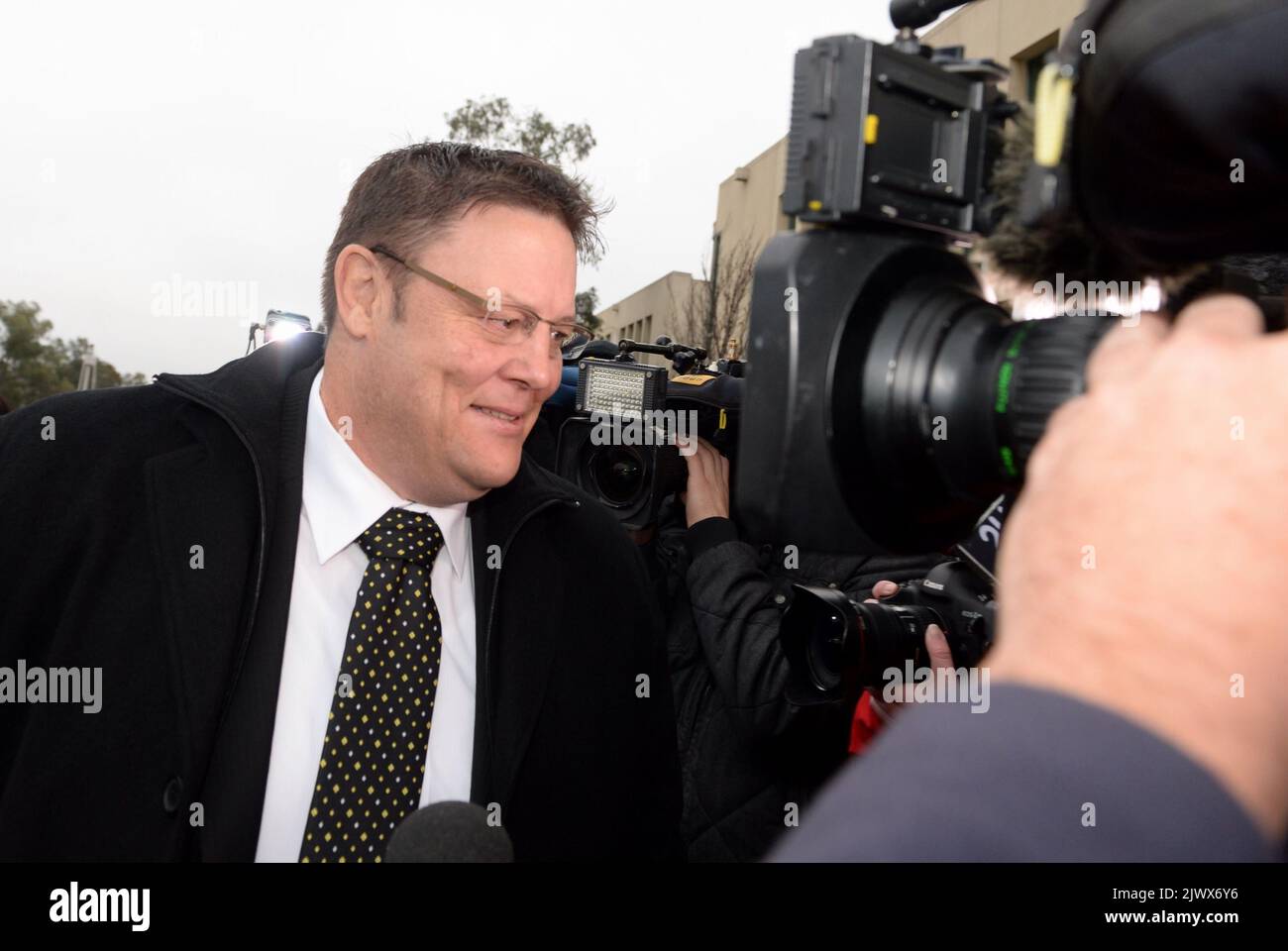 Senator-elect Glenn Lazarus (Qld -PUP) battles the media scrum at ...