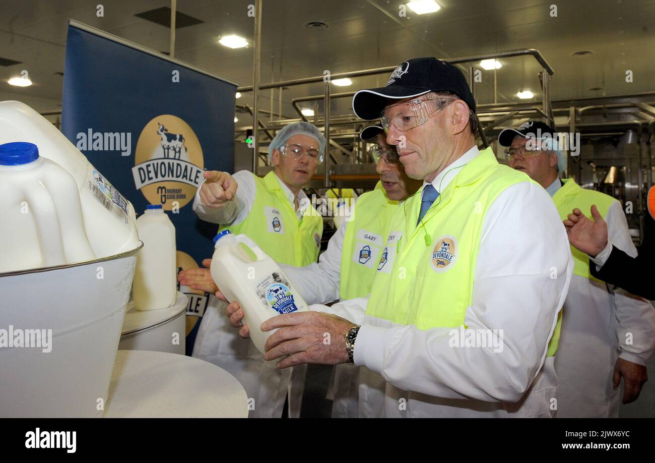Prime Minister Tony Abbott is given a guided tour of the new Devondale ...