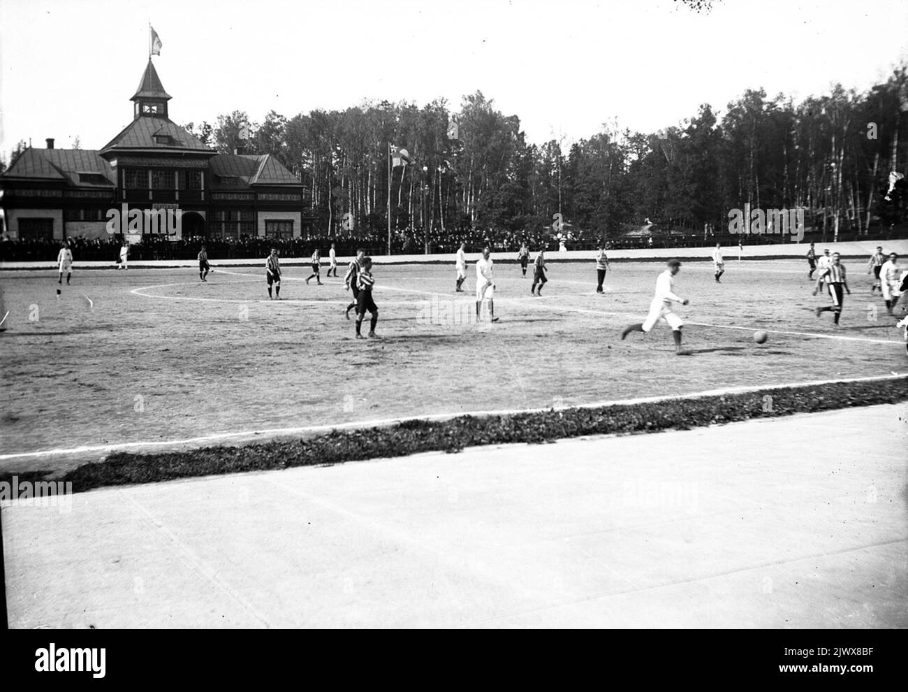 Football kick grass Black and White Stock Photos & Images - Alamy