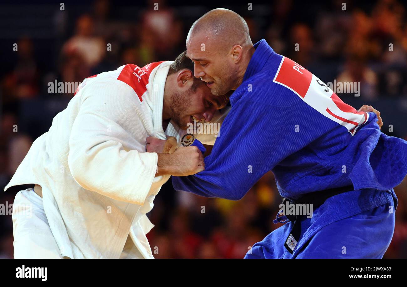 Zack Piontek of South Africa, in action against Matthew Purssey of ...