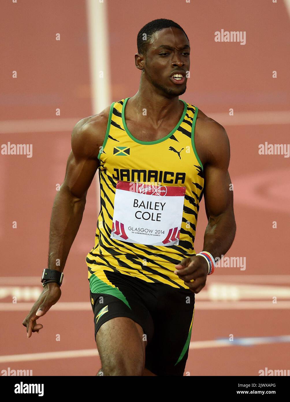 Jamaica's Kemar Bailey-Cole, crosses the finish line to win the Gold medal in the Men's 100m ...