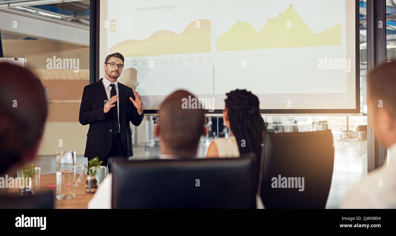 Presenting the figures clearly and concisely. an executive giving a ...