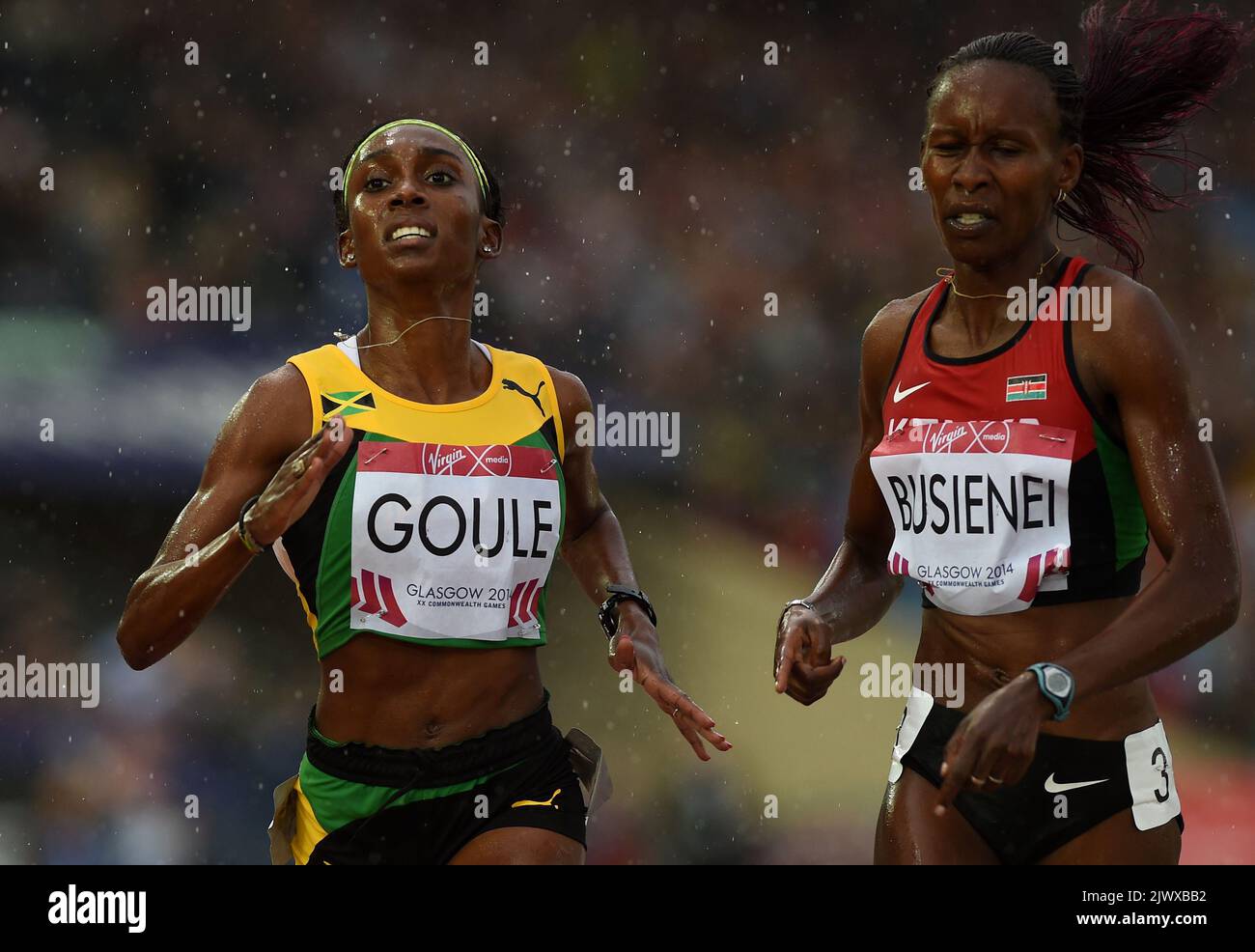 Jamaica's Natoya Goule and Kenya's Janeth Busienei compete in the women ...