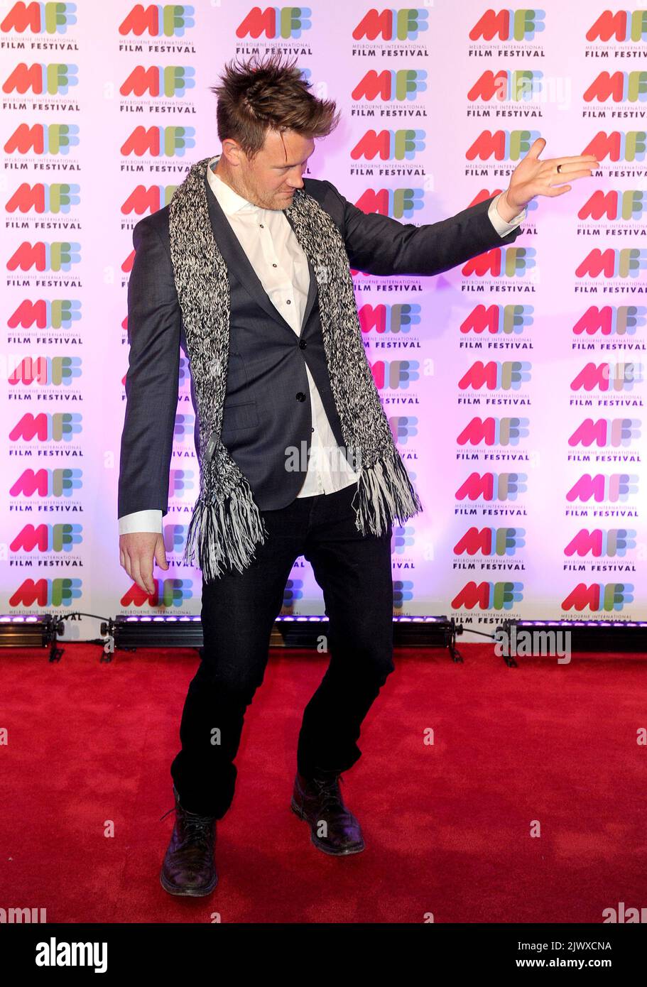 Actor Eddie Perfect on the red carpet at the film premiere of Felony ...