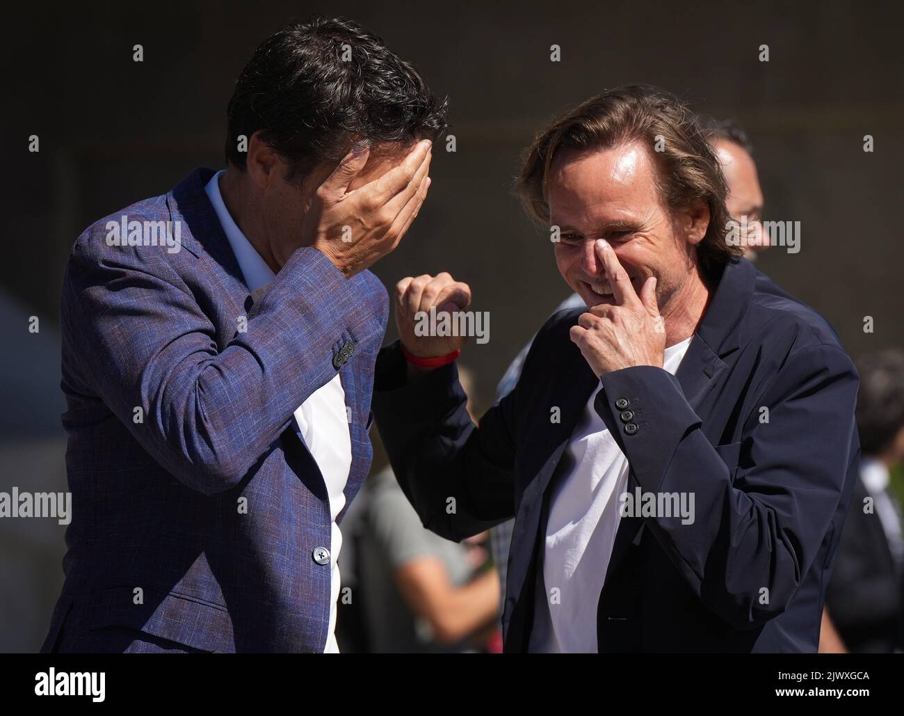 Real estate developer Ian Gillespie, right, founder of Westbank, jokes ...