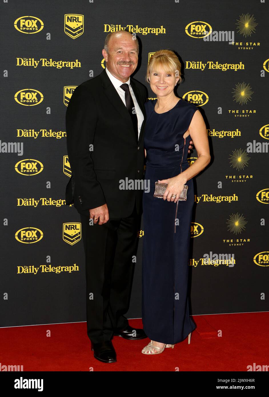 Former rugby league player Wally Lewis with his wife Jacqui on the red ...