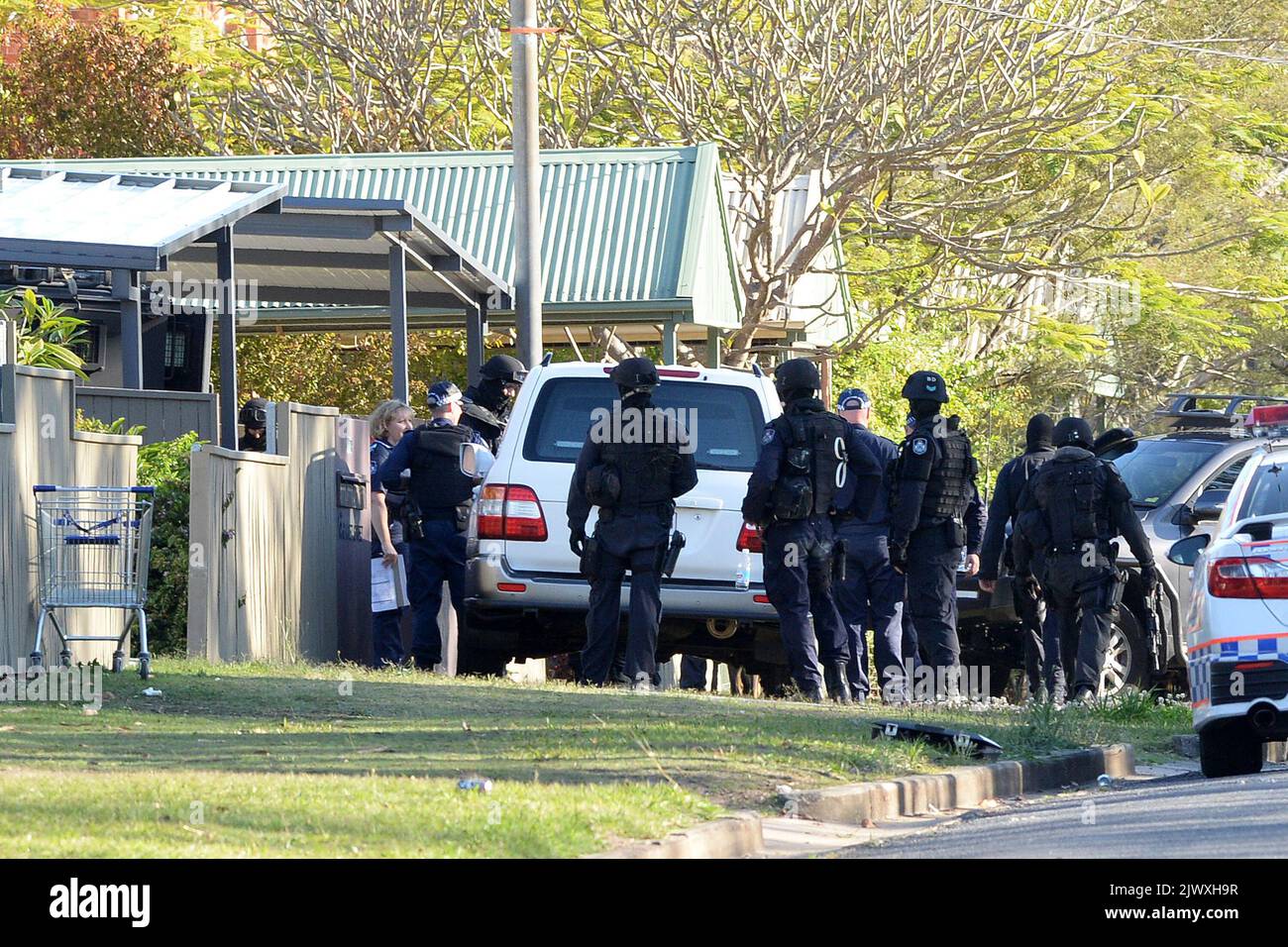 Specialist police attend the scene of a standoff with a gunman in the ...