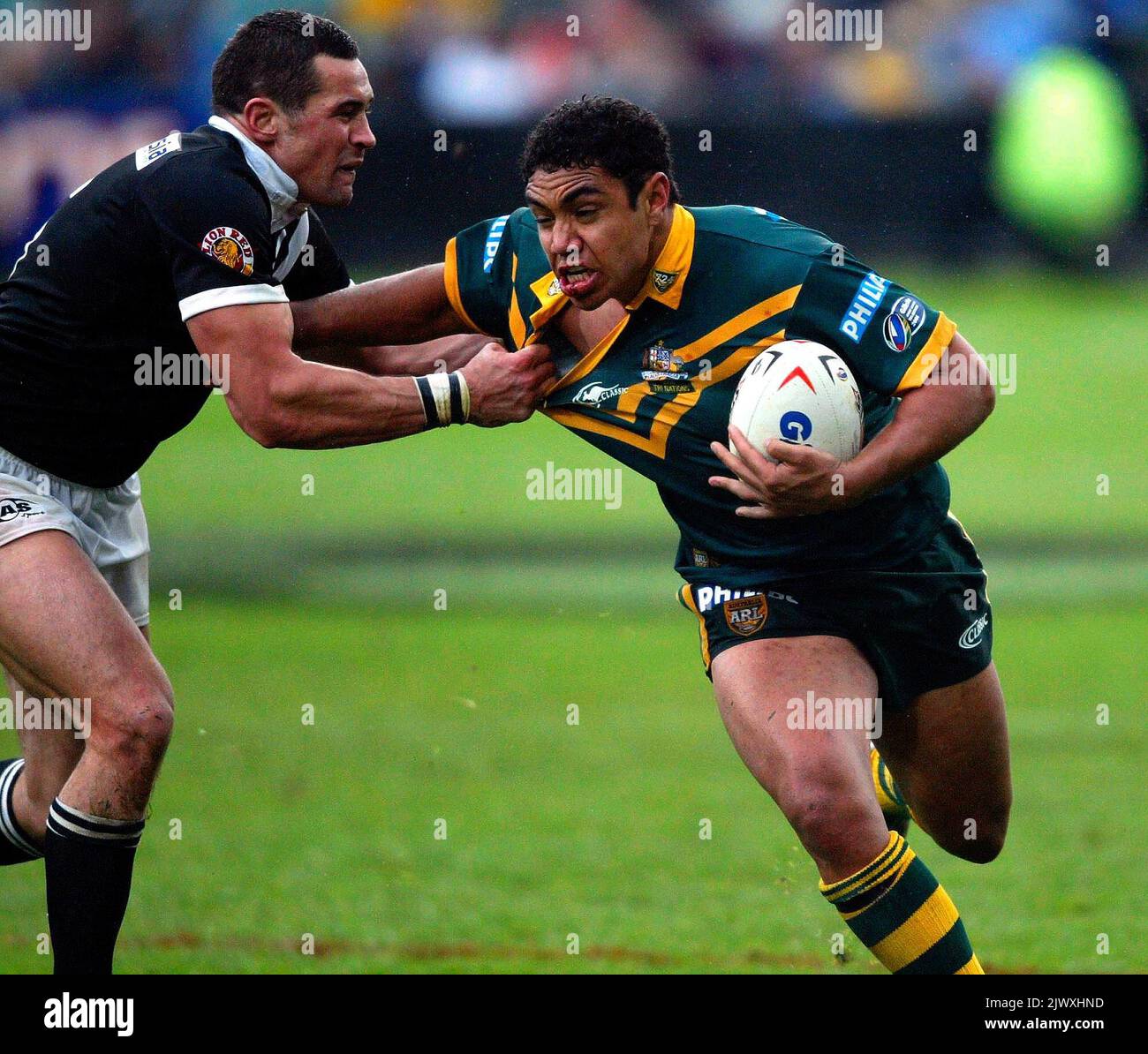 Australia's Willie Tonga tries to avoid New Zealand's Vinnie Anderson ...