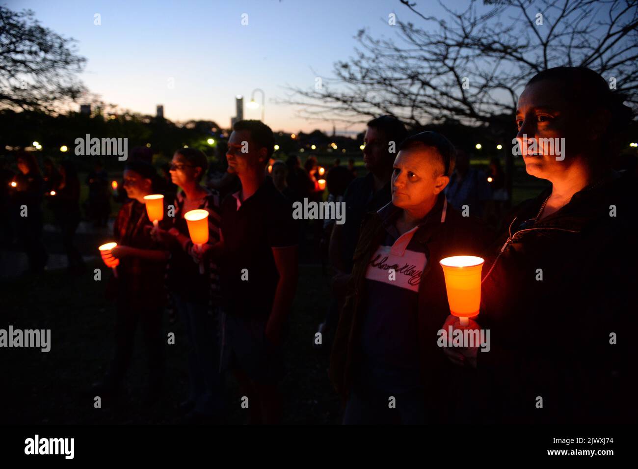 People attend a vigil for murdered transgender woman Mayang Prasetyo in ...