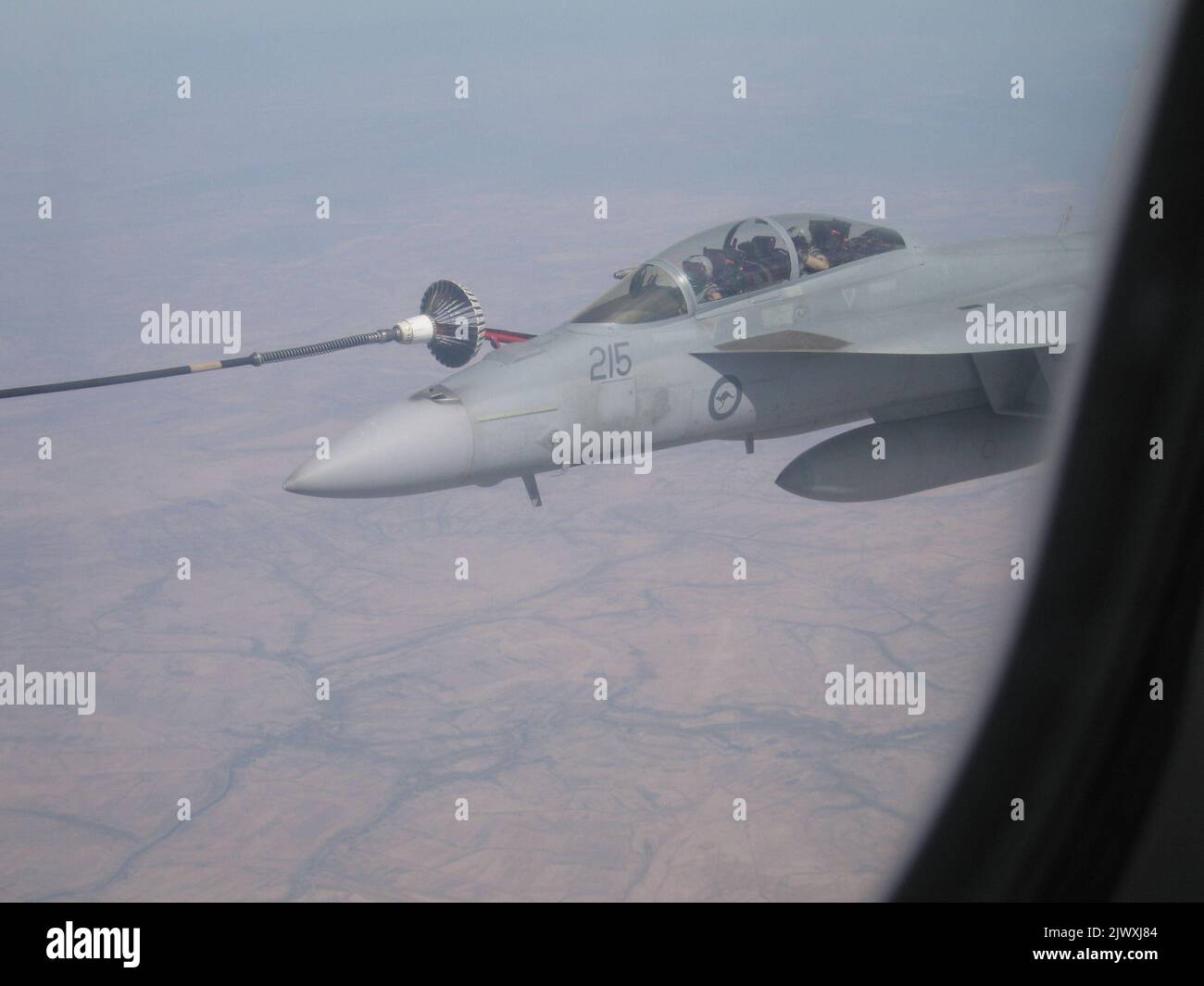 An RAAF Super Hornet refuels from the RAAF's KC-30A tanker aircraft ...