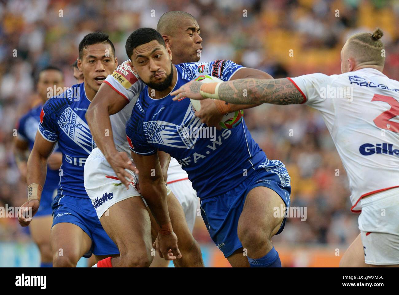 England's Josh Charnley tackles Samoan player Isaac Liu during the Four ...