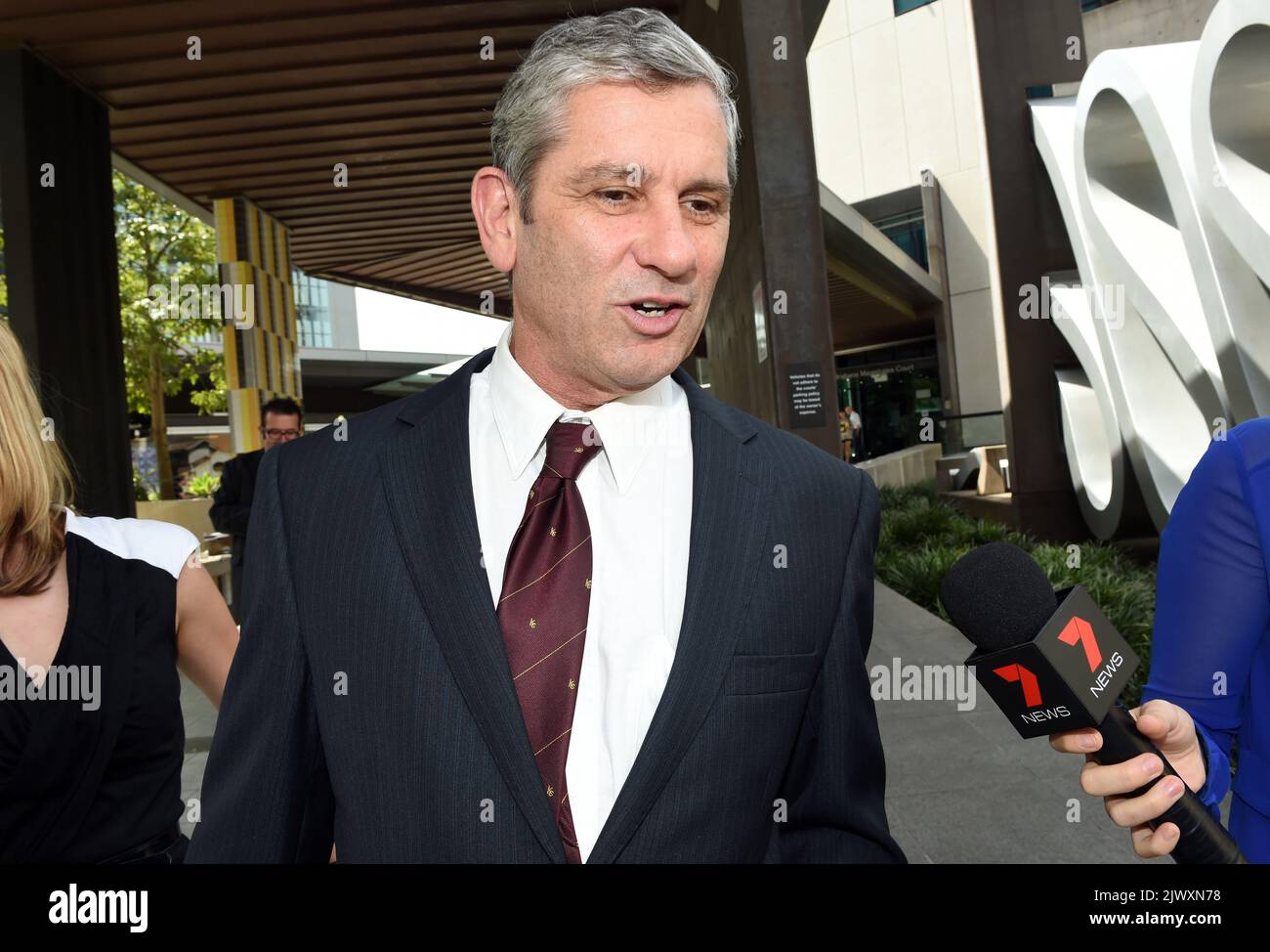 Pilot Captain Neil Cooper leaves the Magistrates Court in Brisbane ...
