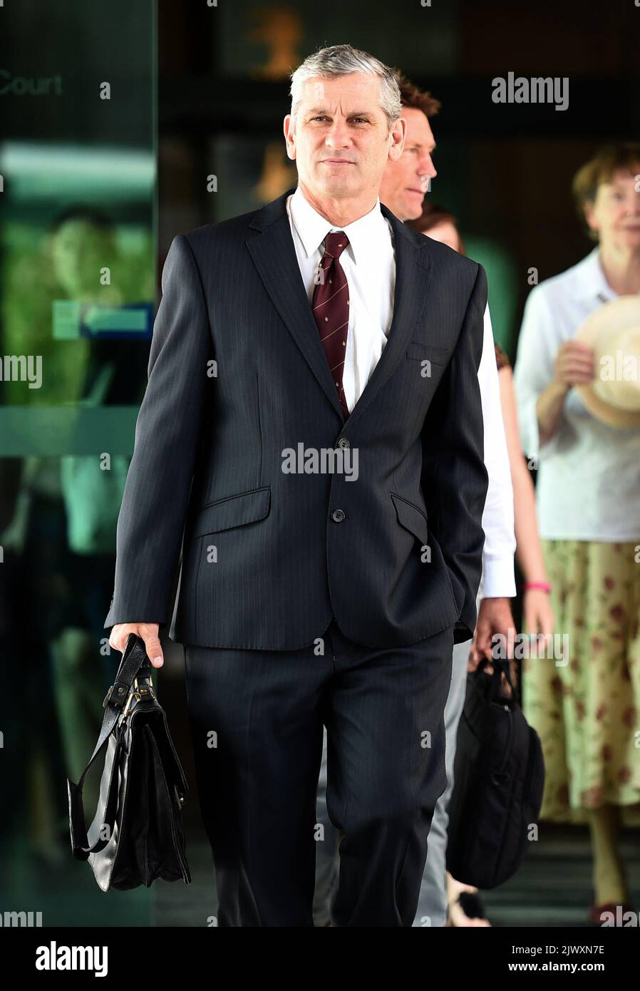 Pilot Captain Neil Cooper leaves the Magistrates Court in Brisbane ...