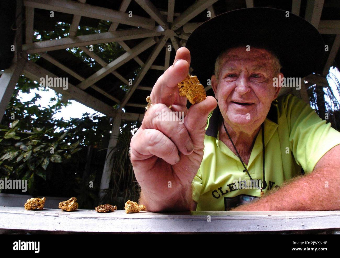 Gold trader and prospector Barry Dunn checks out one of his many gold ...