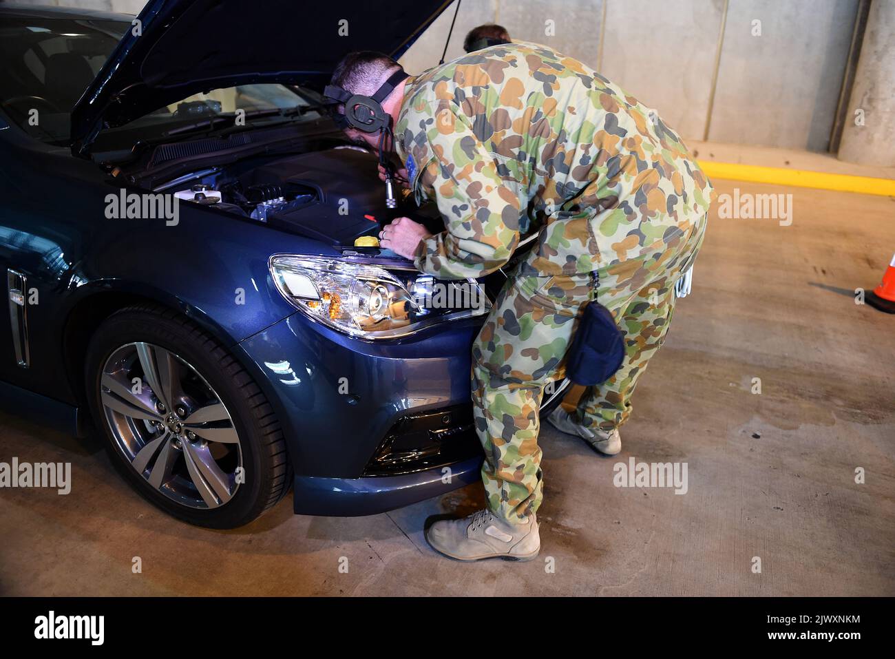 Defence personnel take part in a vehicle search demonstration ahead of ...