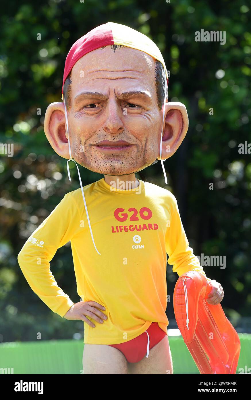 A Caricature of Australian Prime Minister Tony Abbott is seen during an ...
