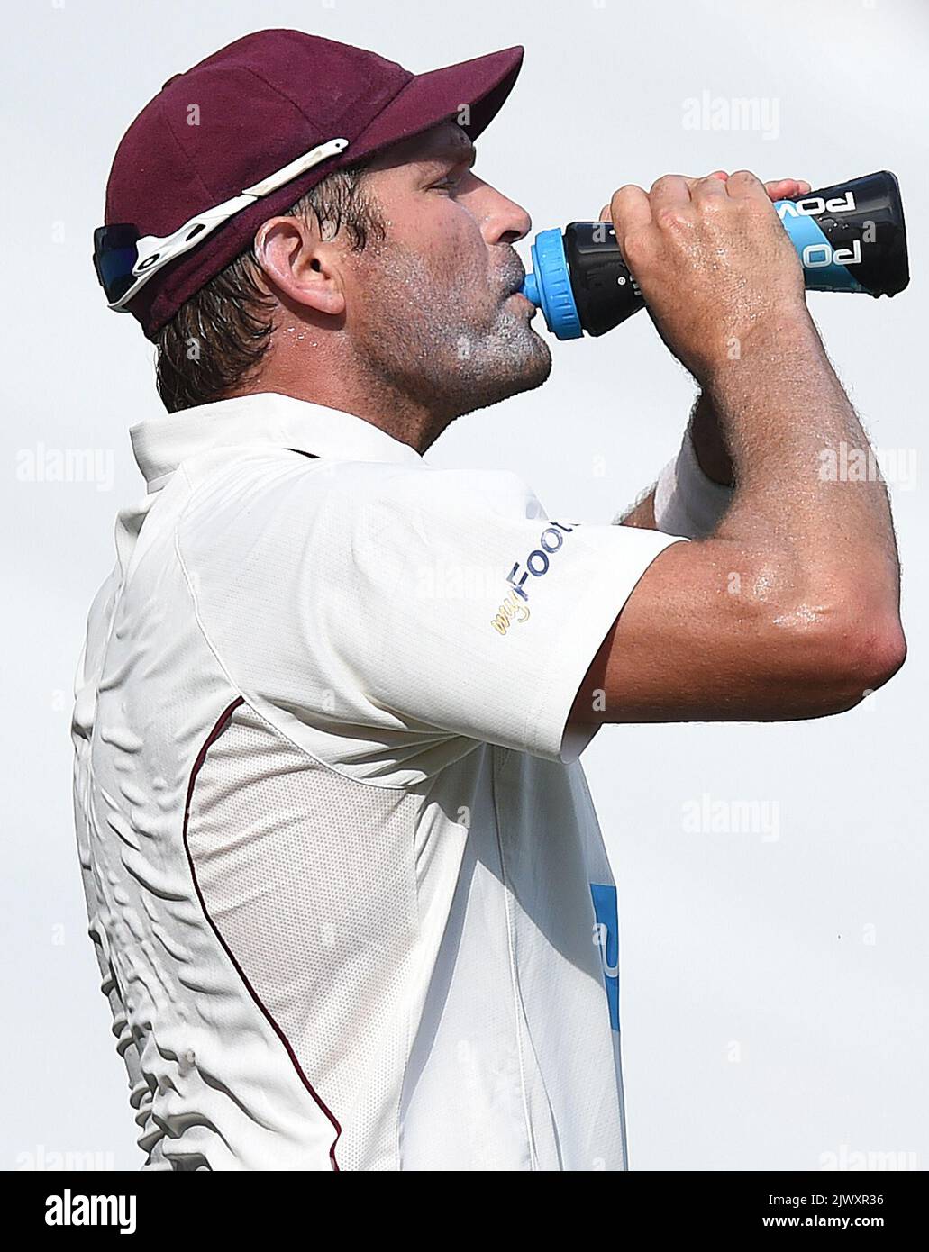 Queensland bowler Ryan Harris takes a drink on day two of the Sheffield ...