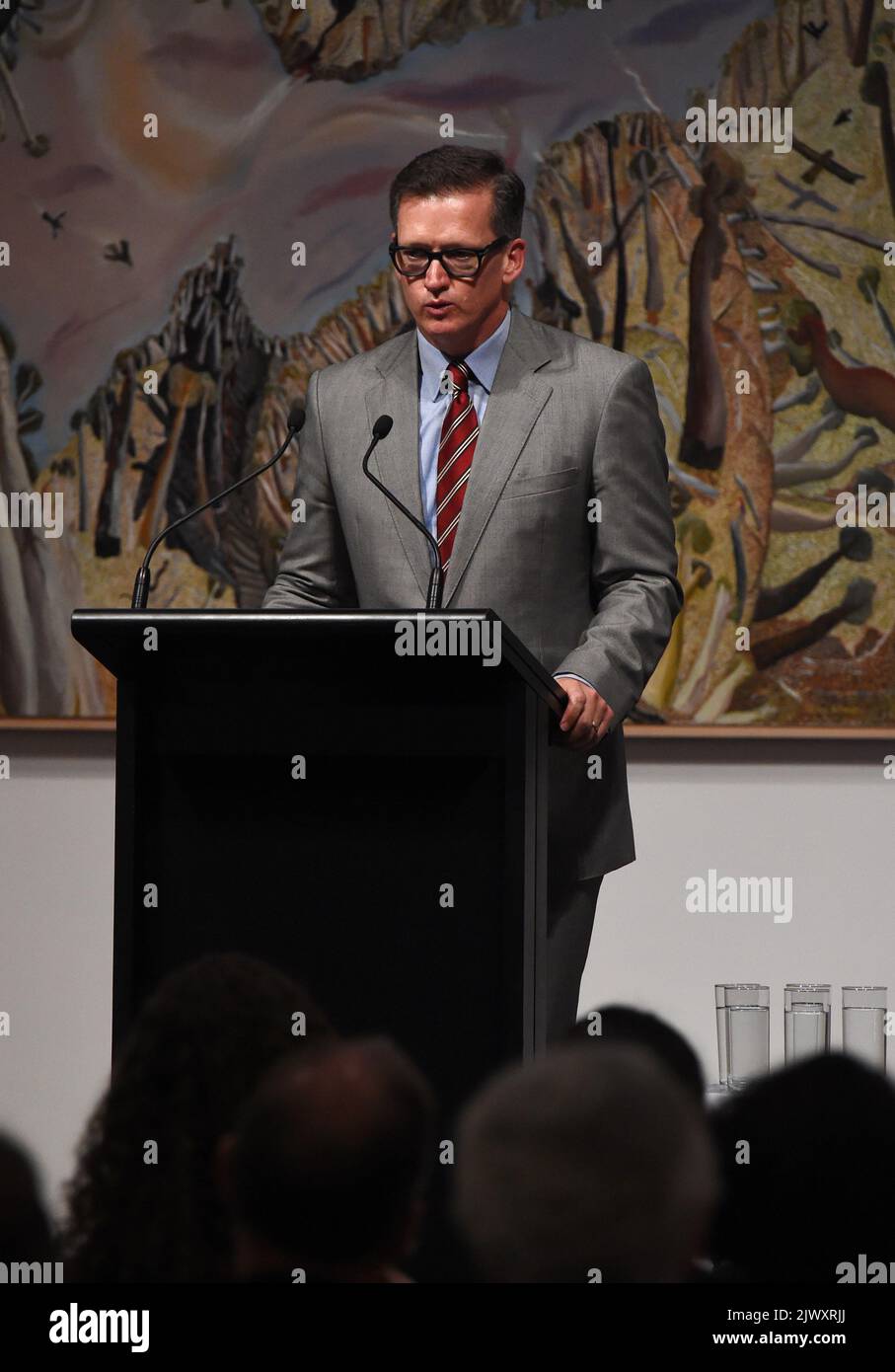Michael Goss speaks during the memorial for his brother and former ...