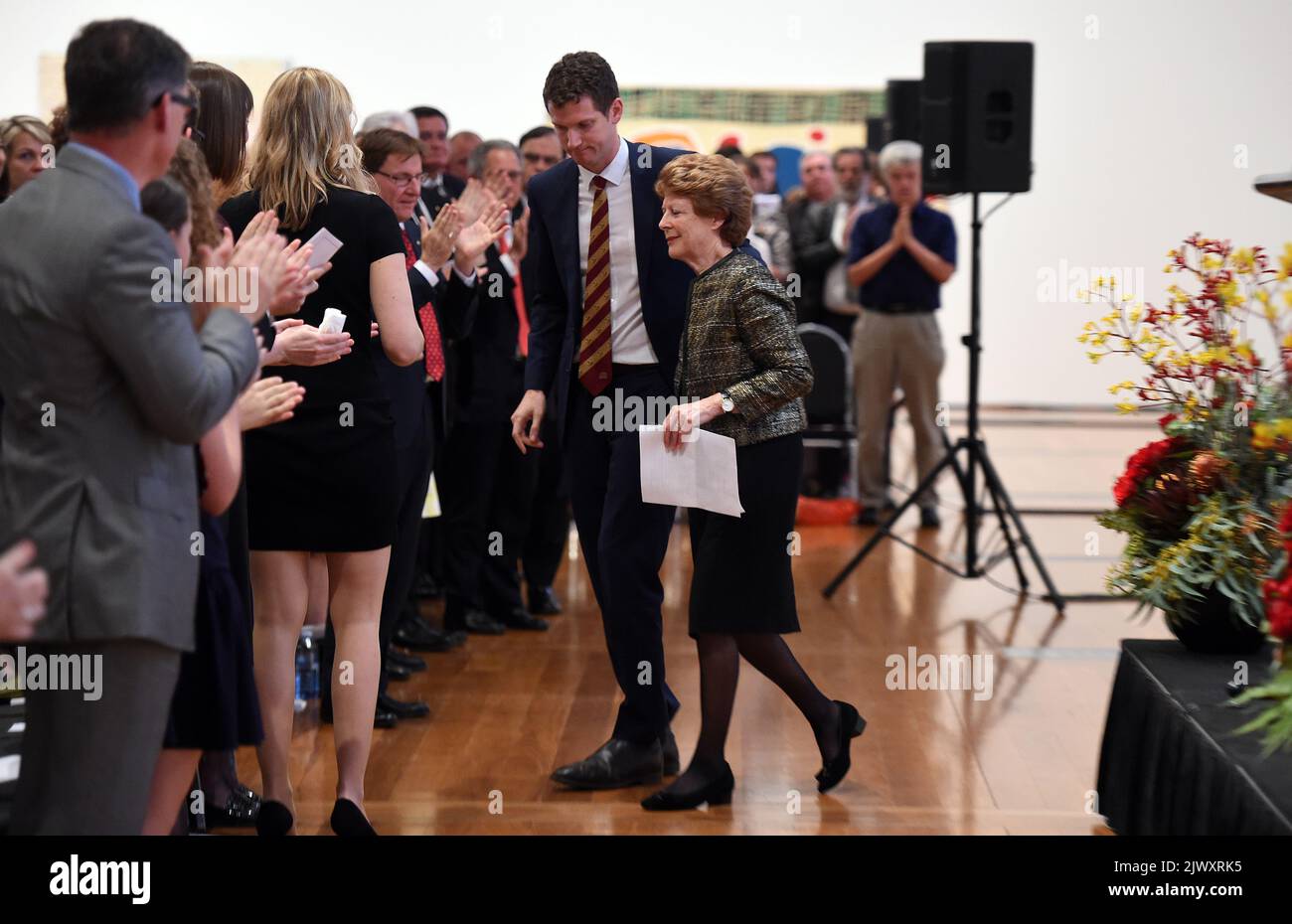 Former Queensland premier Wayne Goss wife Roisin is hugged by their son ...