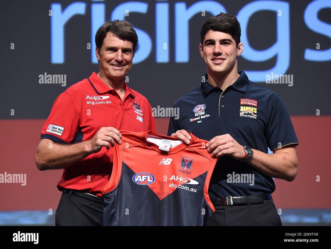 Melbourne Demons coach Paul Roo's poses for a photograph with #2 draft ...