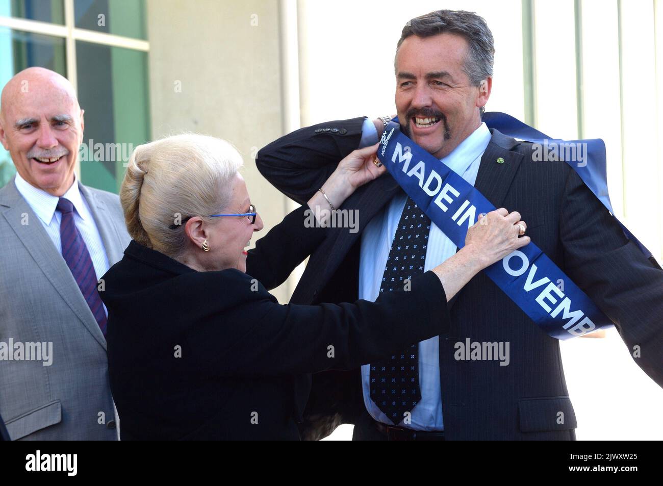 Speaker Bronwyn Bishop presents the winners ribbon to MP Darren Chester ...