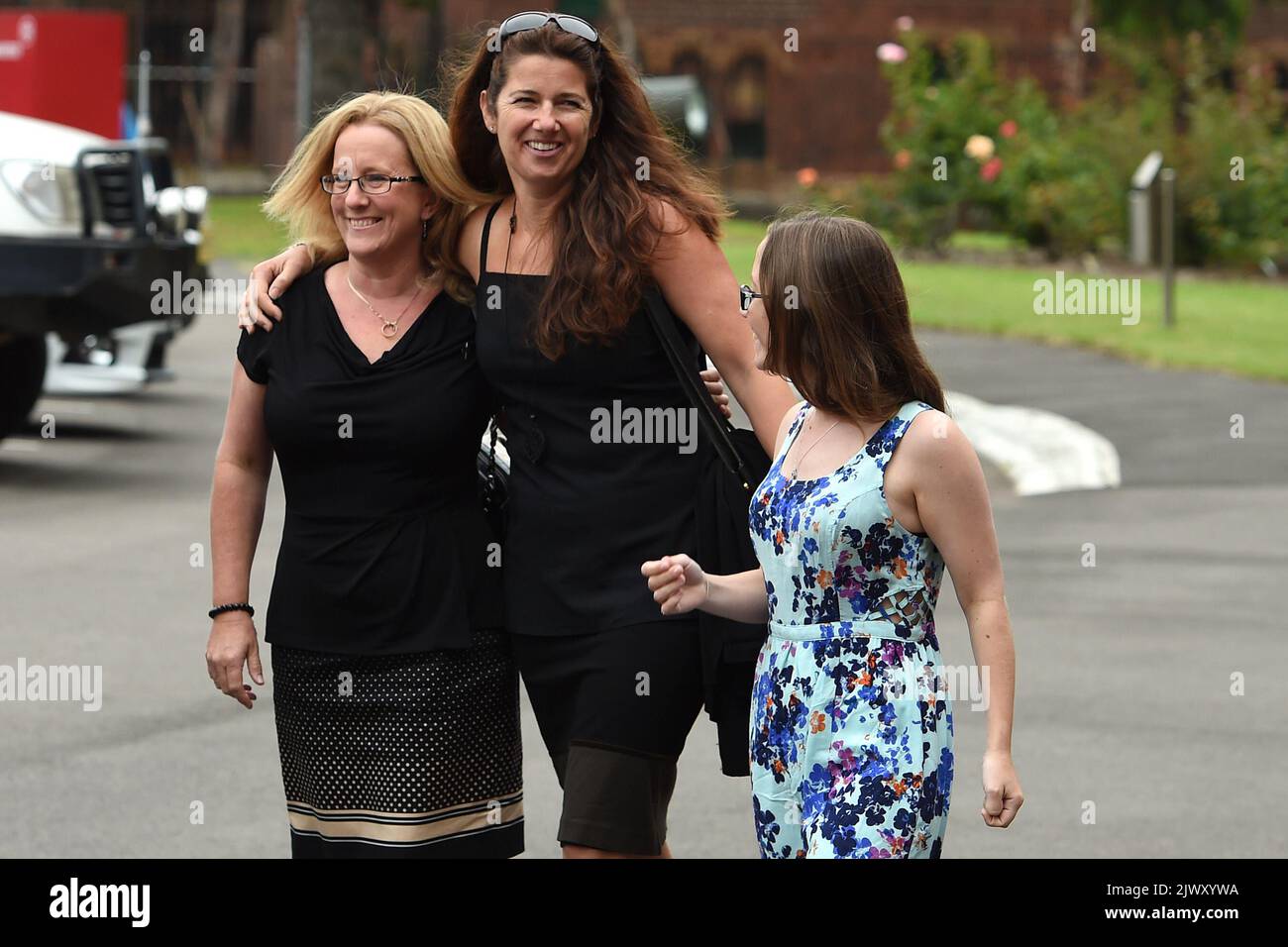The wife of slain police officer Bryson Anderson, Donna (left), and ...