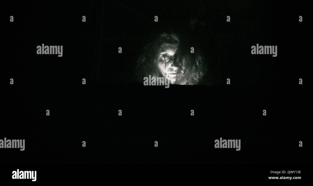scary woman behind window at night Halloween horror background Stock ...