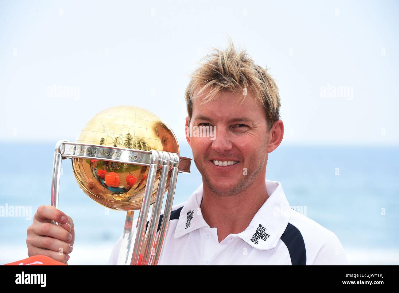 Former Australian fast bowler Brett Lee shows off the ICC Cricket World ...