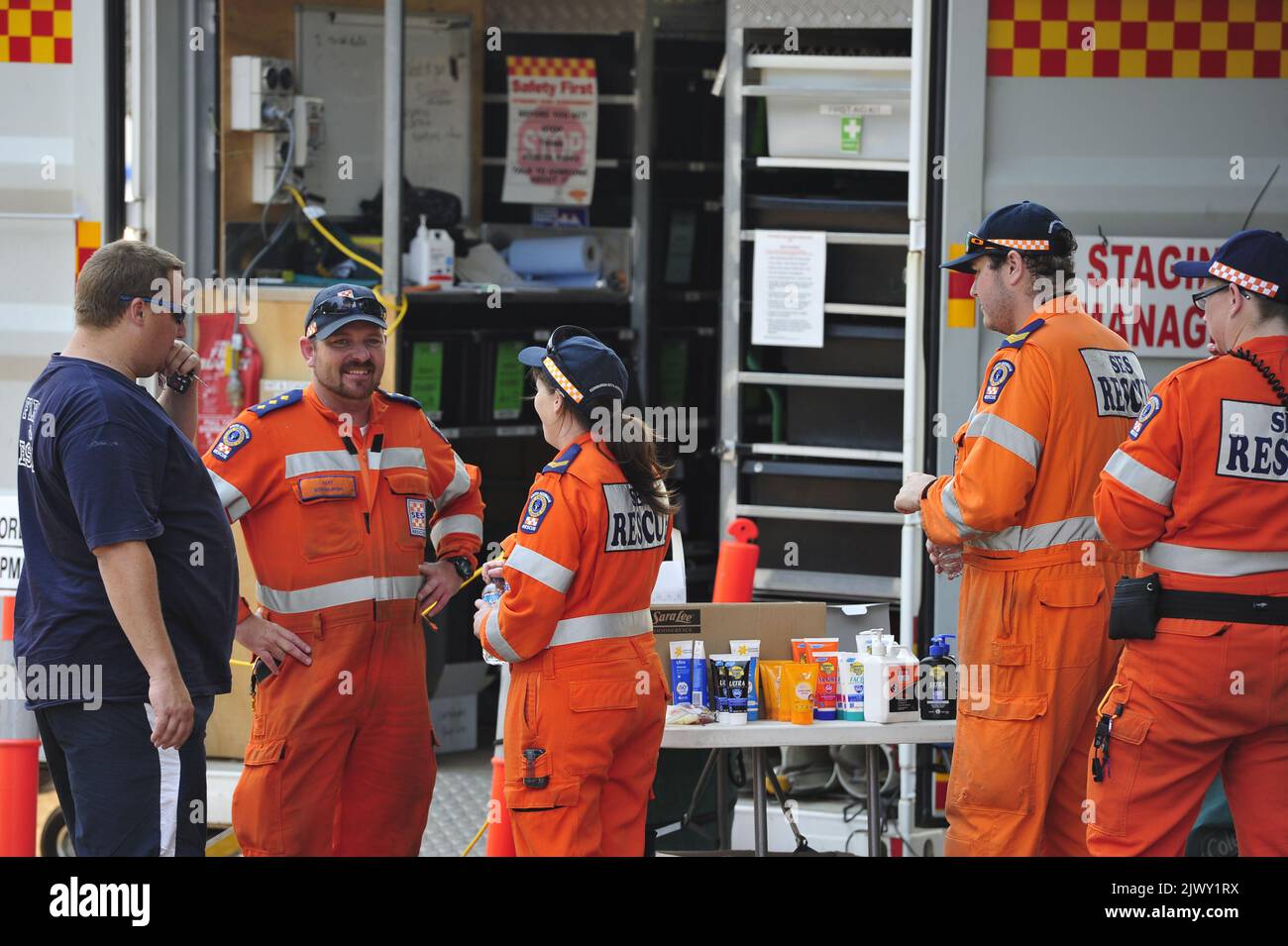 Emergency services staff at the One Tree Hill staging area as fires ...