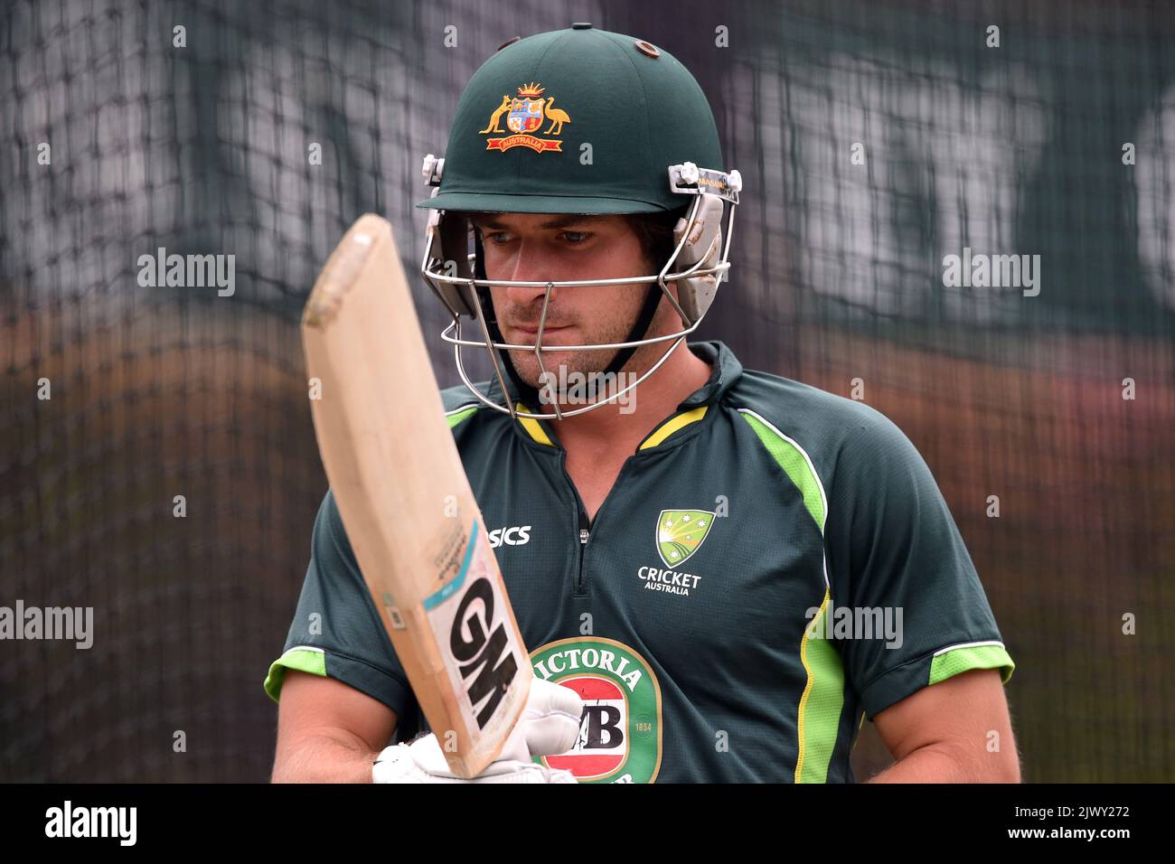 Australian cricketer Joe Burns trains during a light nets session ahead ...