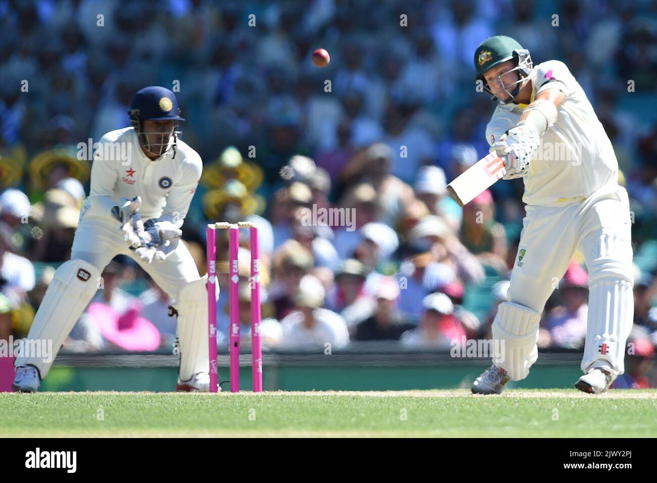 Ryan Harris of Australia hits India's Praveen Kumar for four on day two ...