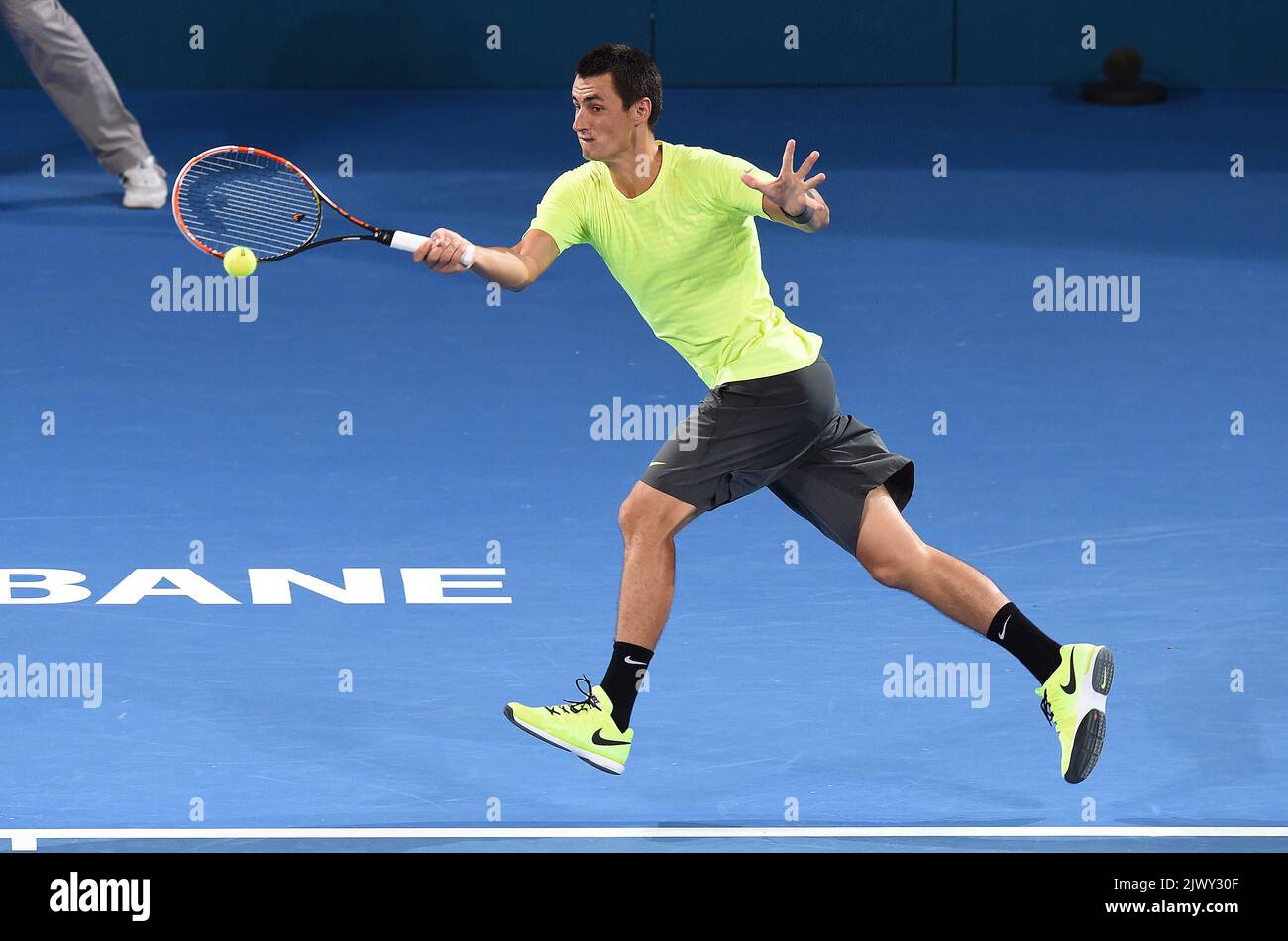 Australia's Bernard Tomic returns to Thomas Kokkinakis of Australia ...