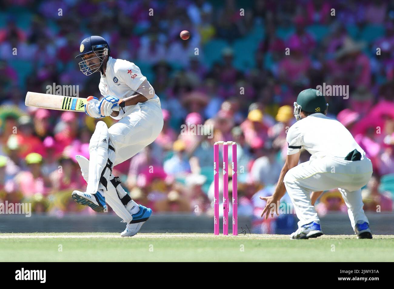 India's lokesh Rahul (left) ducks under a bouncer bowled by Mitchel ...