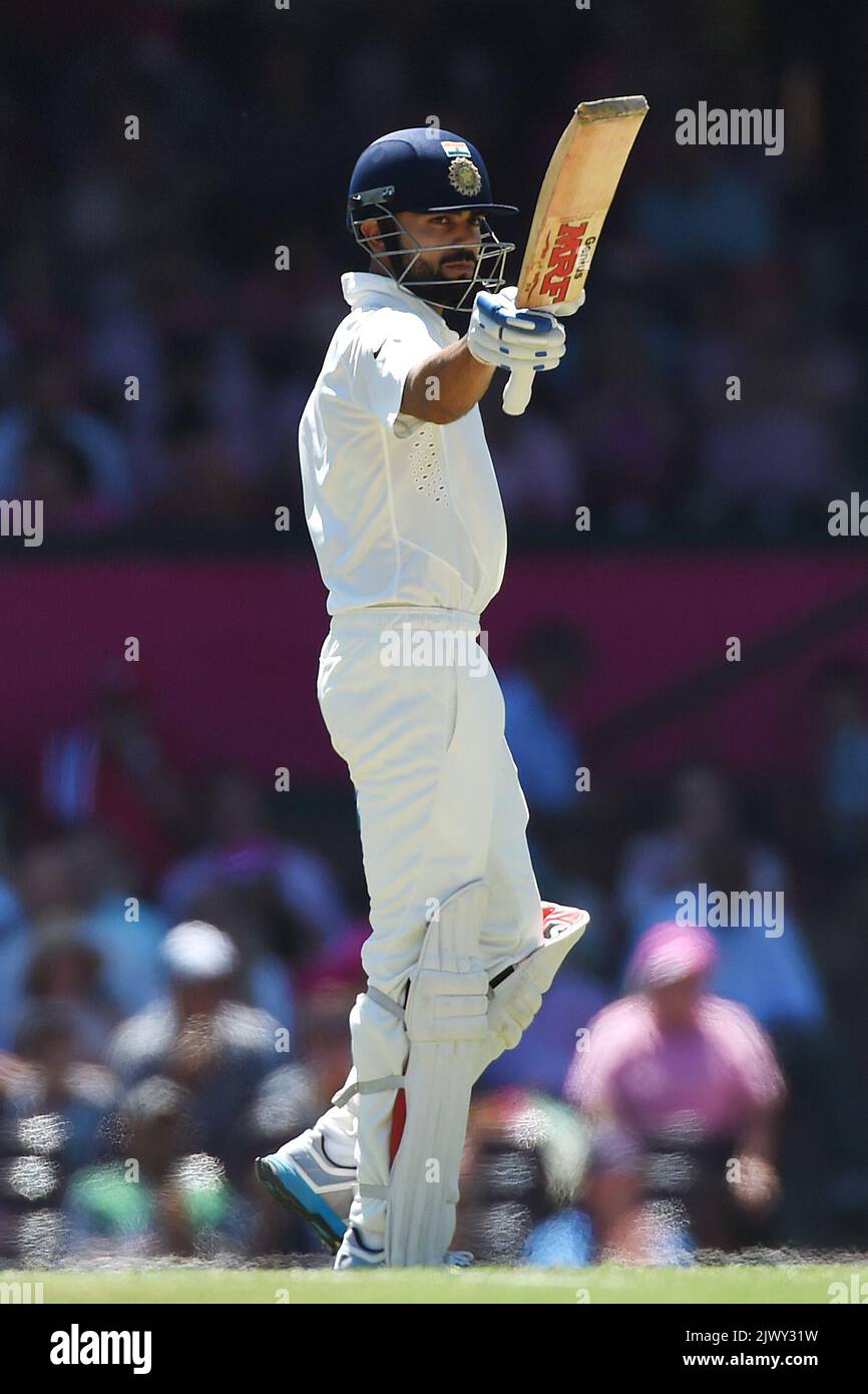 India's Virat Kohli acknowledges the crowds applause after scoring a ...