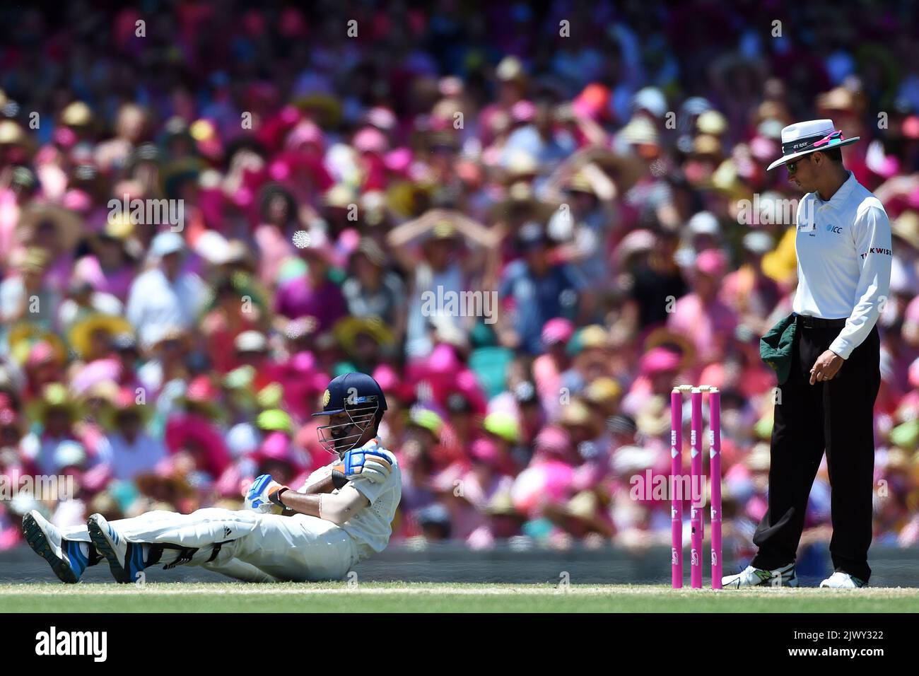 India's Lokesh Rahul gets up from the pitch after diving to avoid being ...