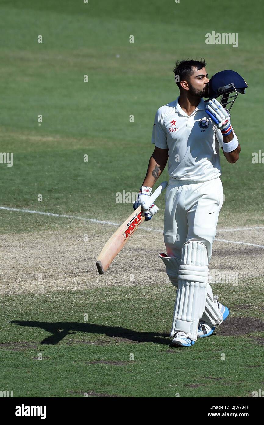 India's Virat Kohli celebrates scoring a century against Australia on ...