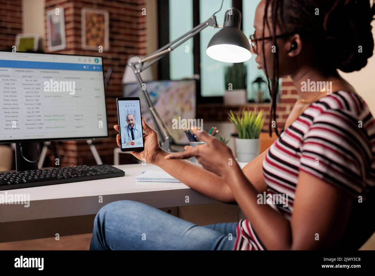 Gp doctor phone call hi-res stock photography and images - Alamy