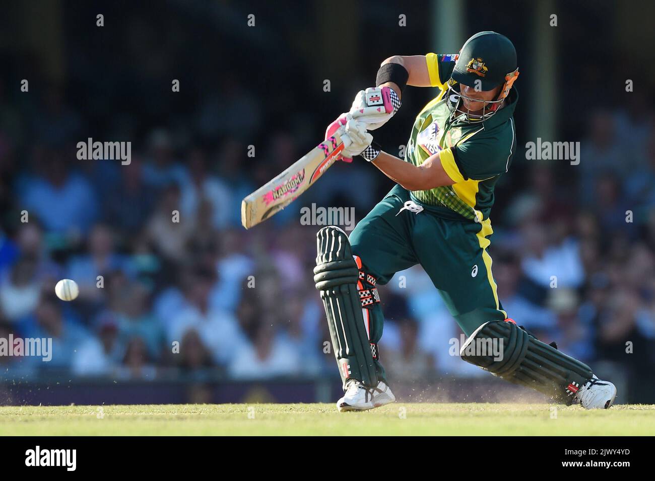 David Warner of Australia drives the ball during the Tri-Series One Day ...