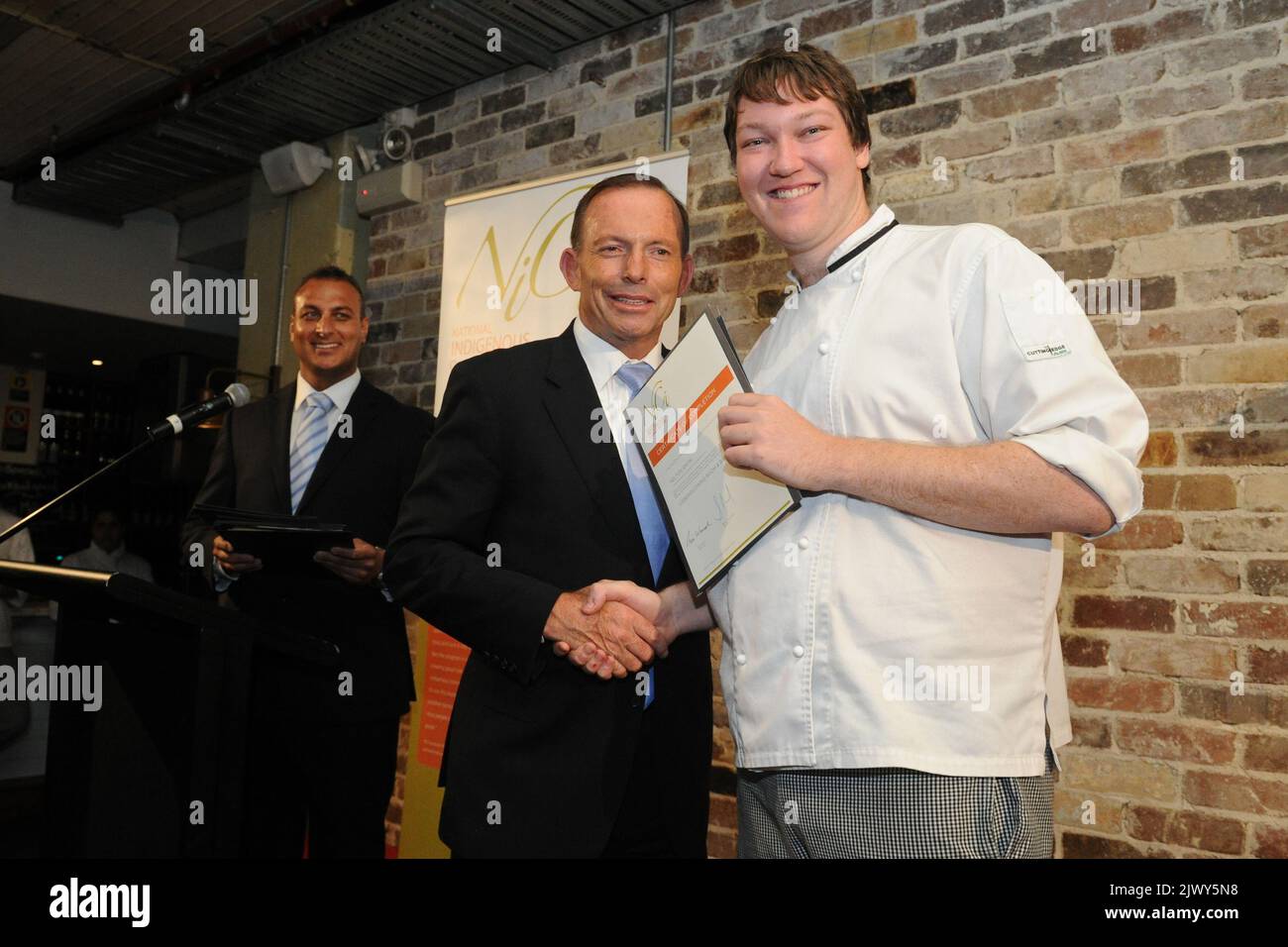 Prime Minister Tony Abbott presents an award to Kelton Morgan-Smith at ...