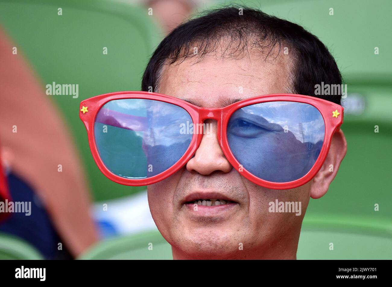 A Korean fan enjoys himself, during the Asian Cup Quarter Final match ...