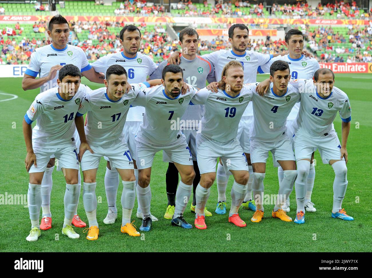 Uzbekistan players pose for a team photo, during the Asian Cup Quarter ...