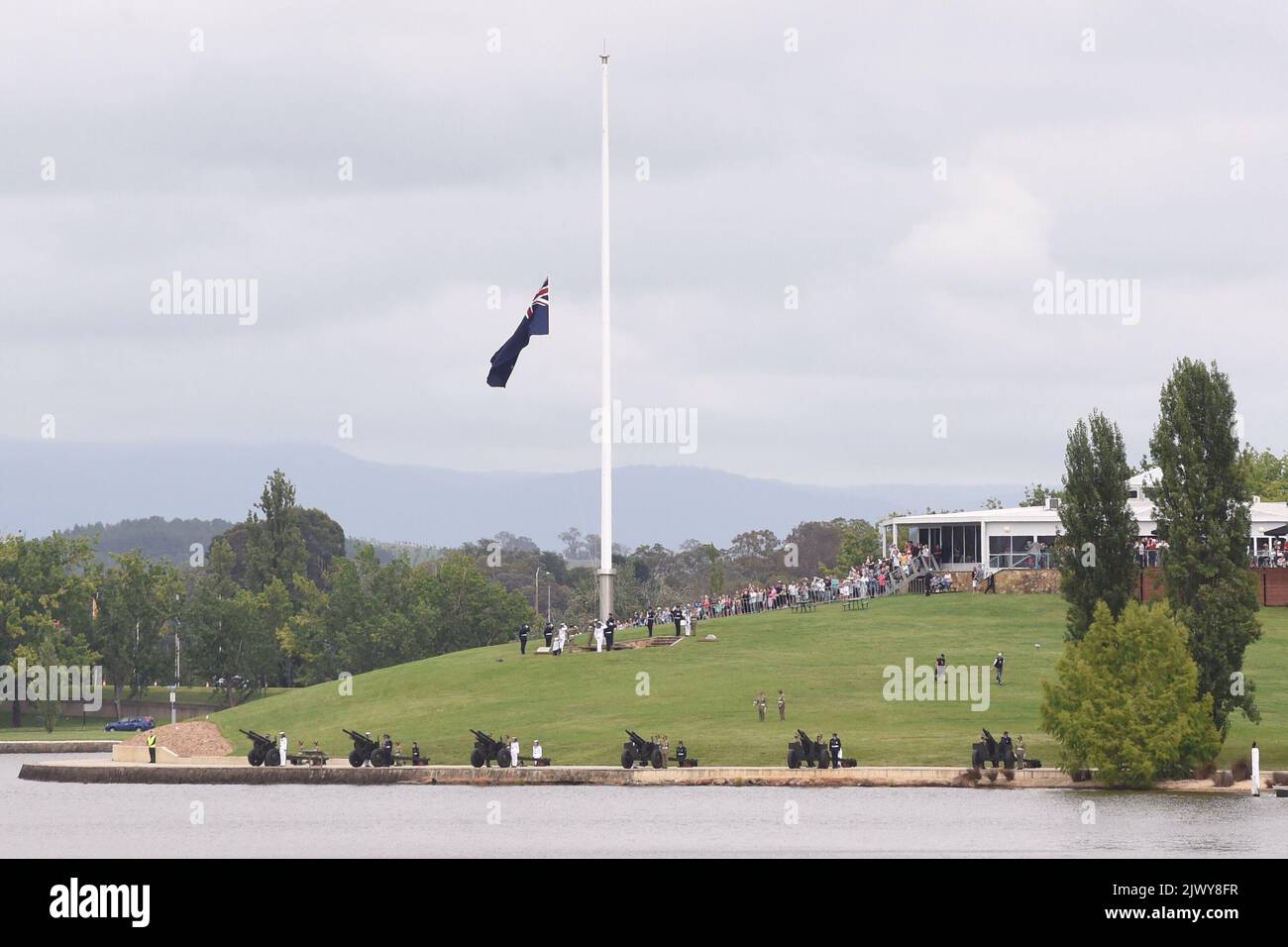 The flag is raised at an Australia Day Citizenship Ceremony and Flag ...