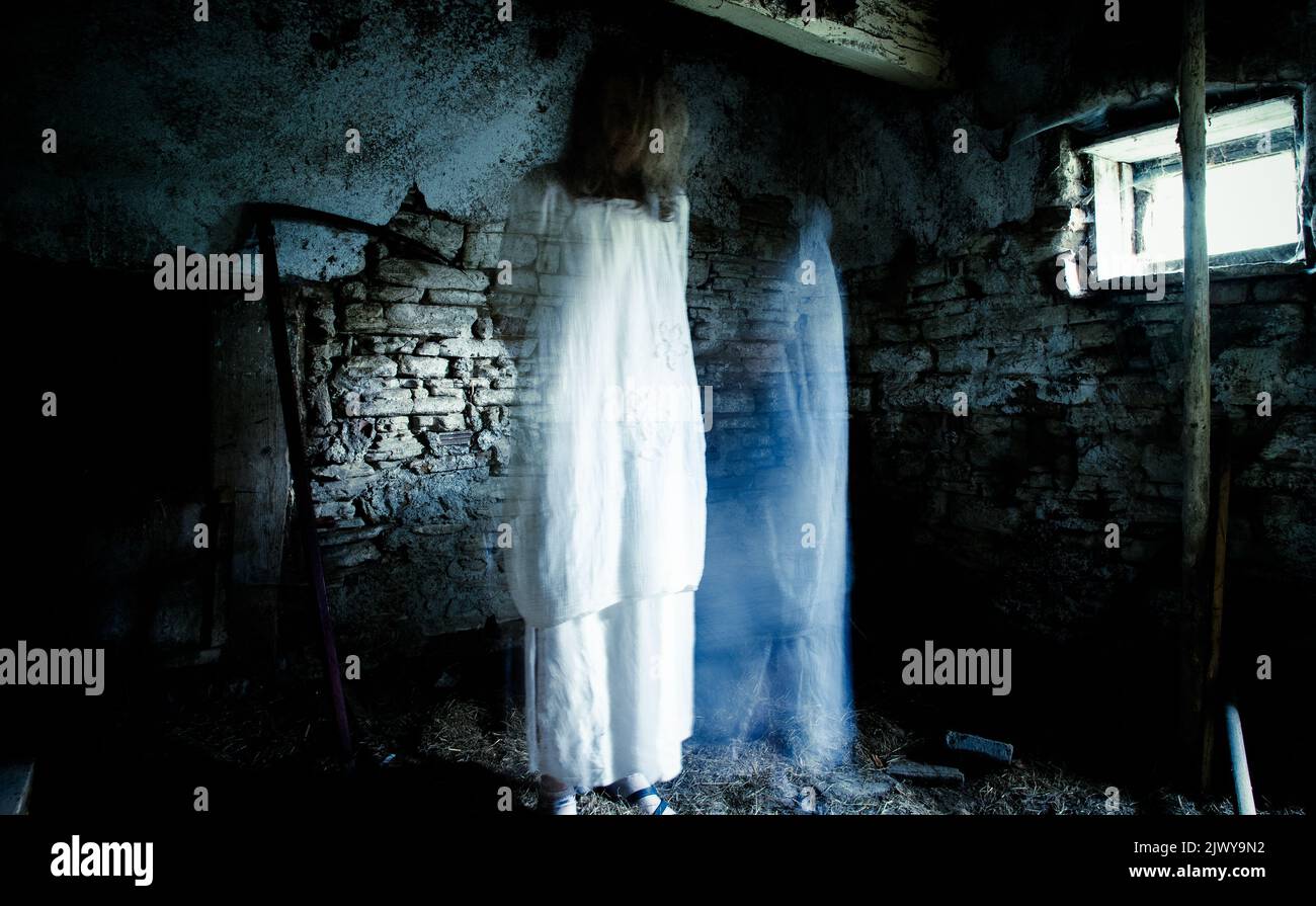 scary ghost in abandoned building at night Halloween background Stock ...