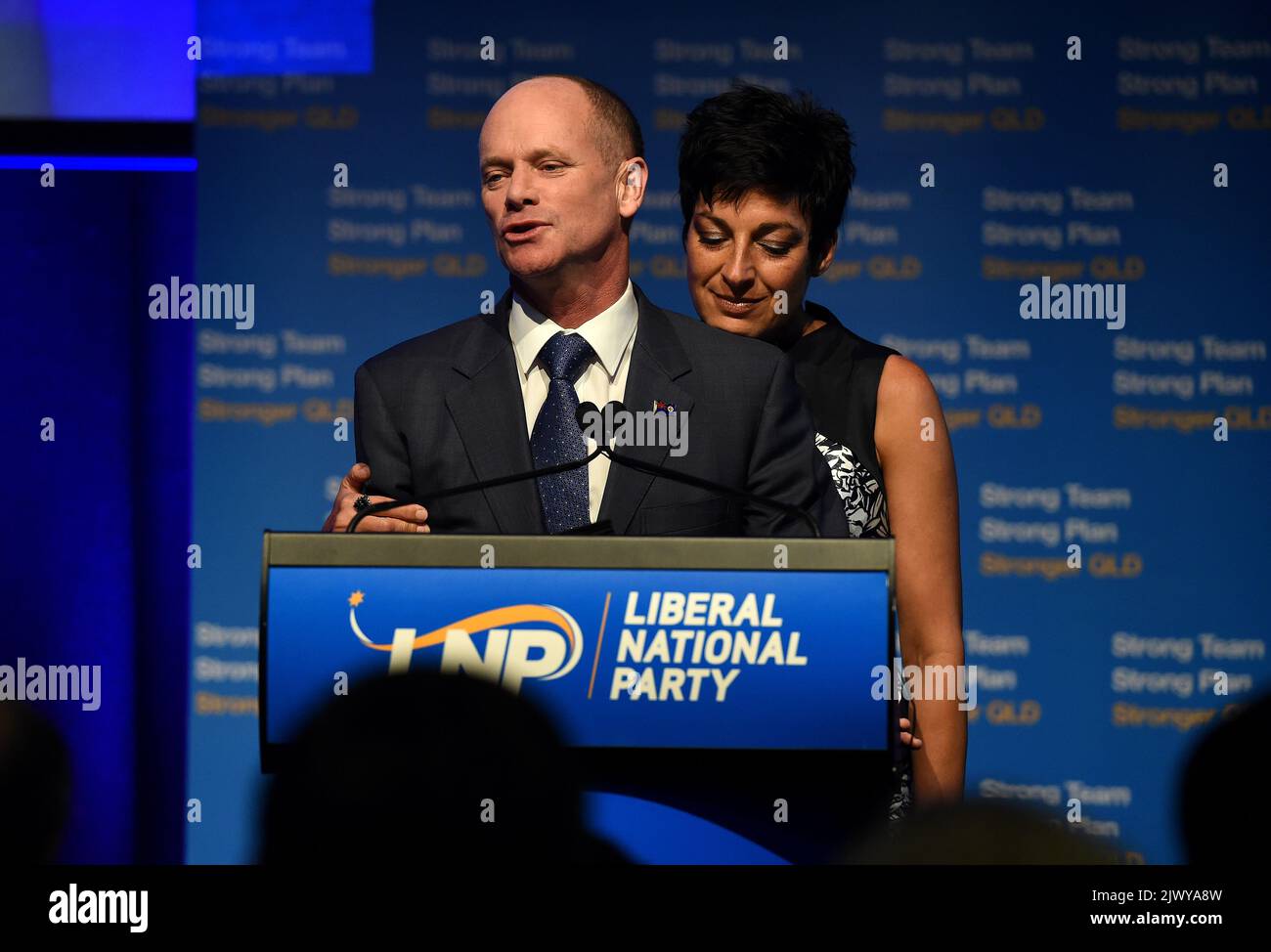 Queensland Premier Campbell Newman, flanked by his wife Lisa, concedes ...