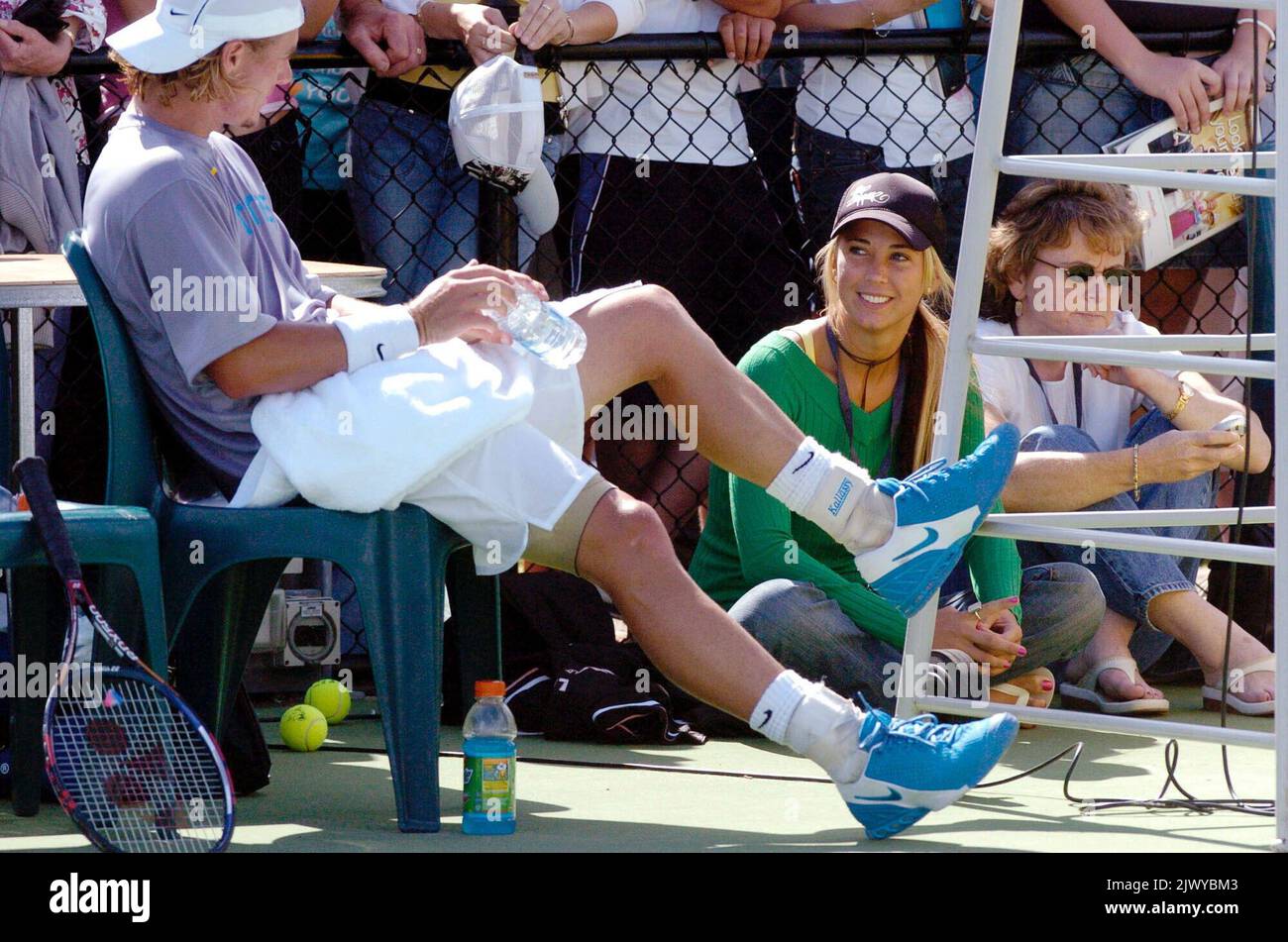 Australia's Leyton Hewitt sits with his new girlfriend Bec Cartwright ...