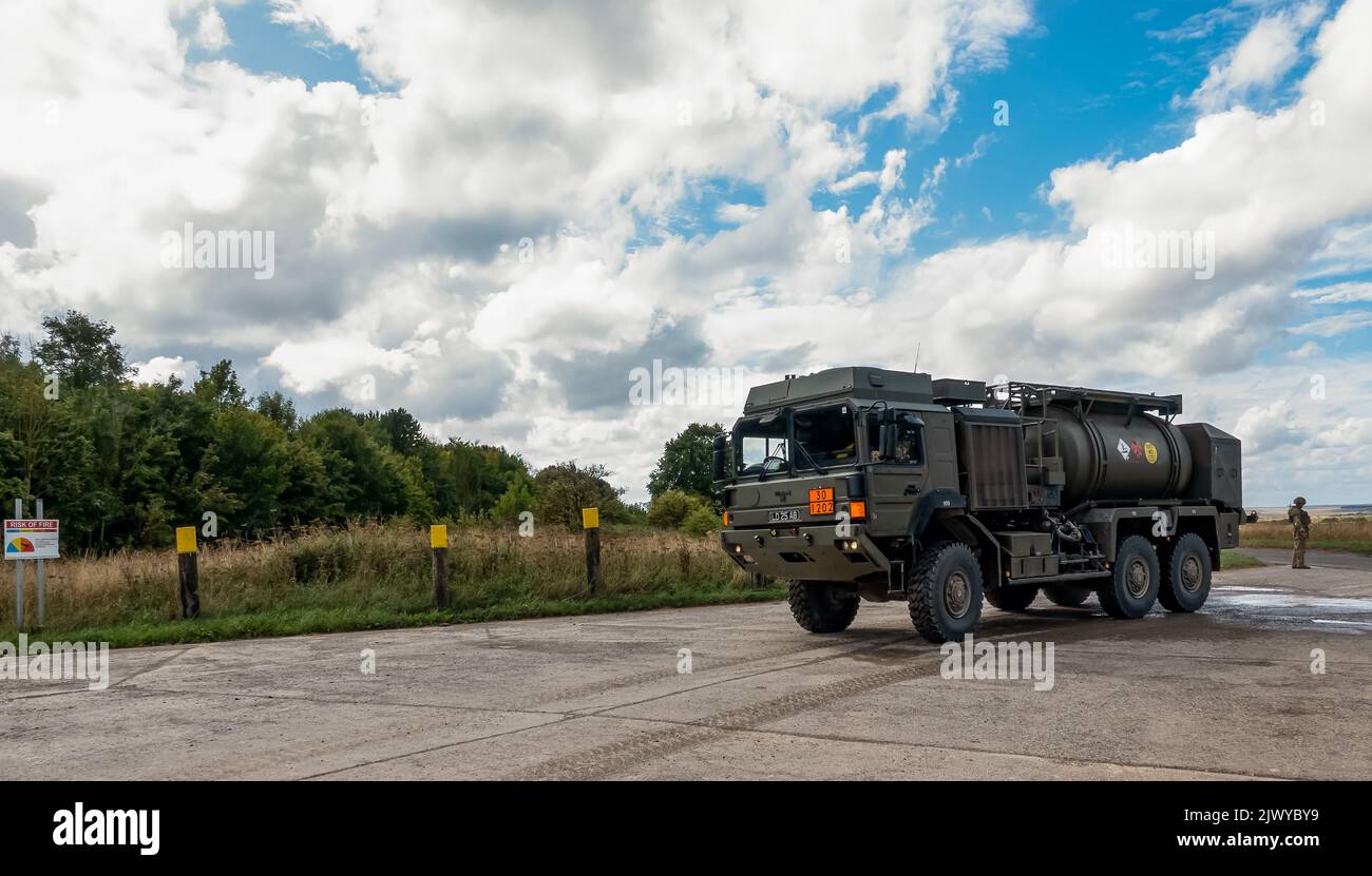 British army M.A.N. unit support tanker in action on a military ...
