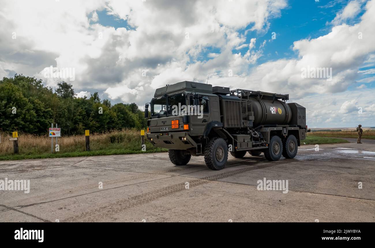 British army M.A.N. unit support tanker in action on a military ...